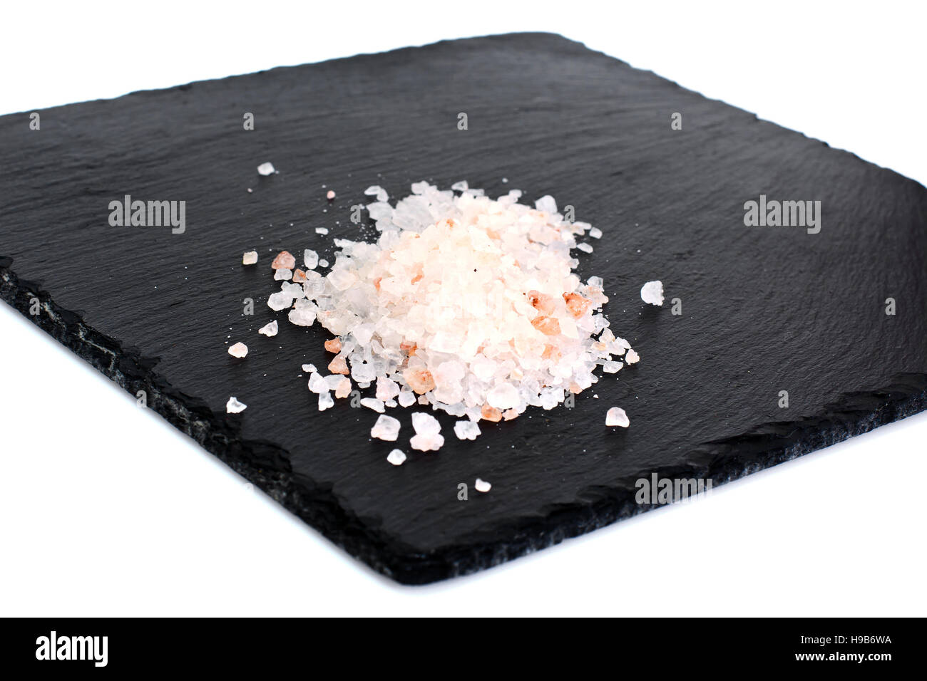 Pink Salt in Black Stone Background Studio Photo Stock Photo - Alamy