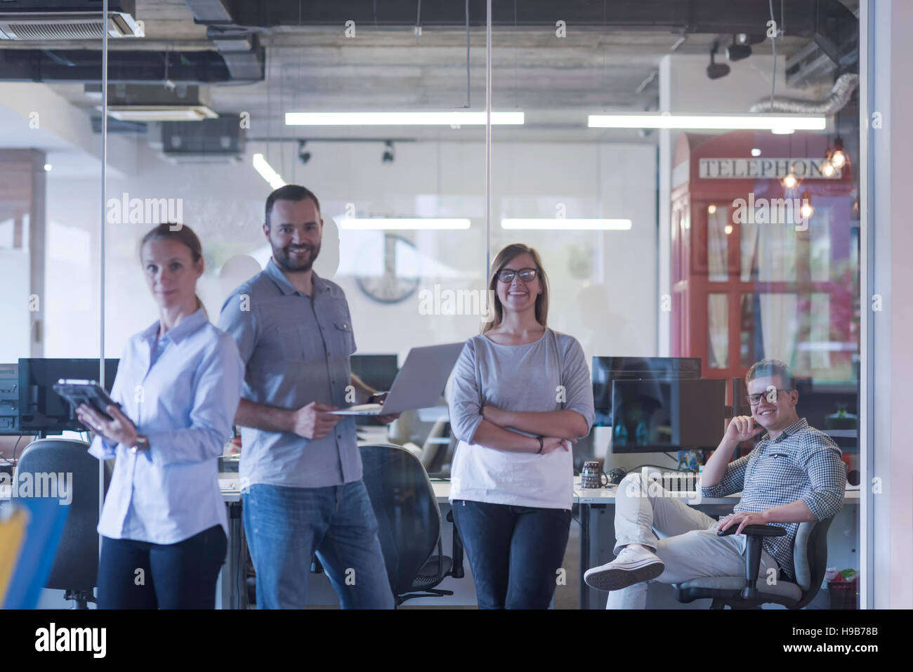 start up business team portrait at modern office interior Stock Photo ...