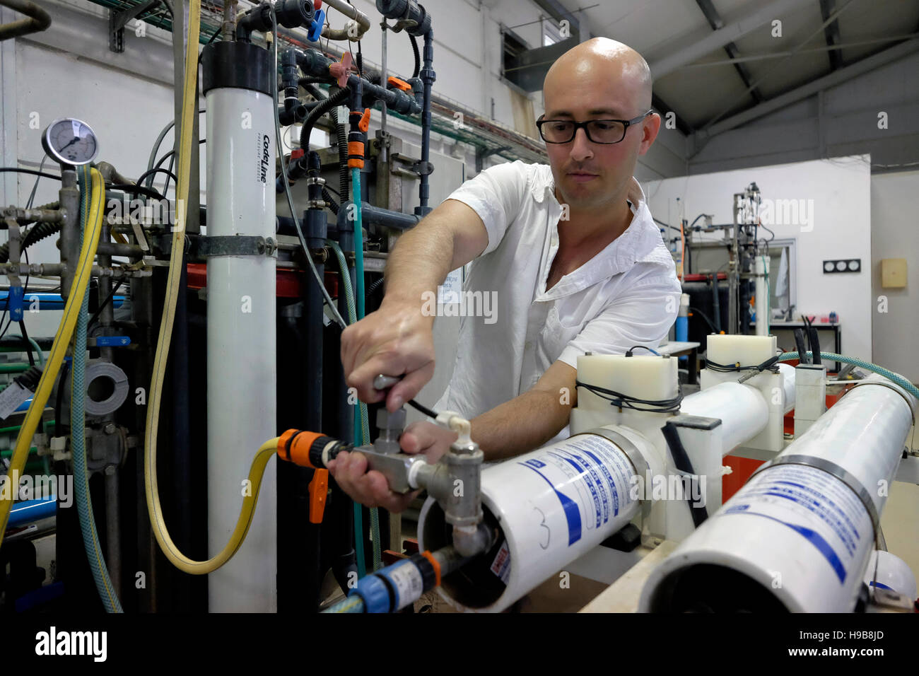 Water researcher Edo Bar-Zeev running a water desalination experiment ...