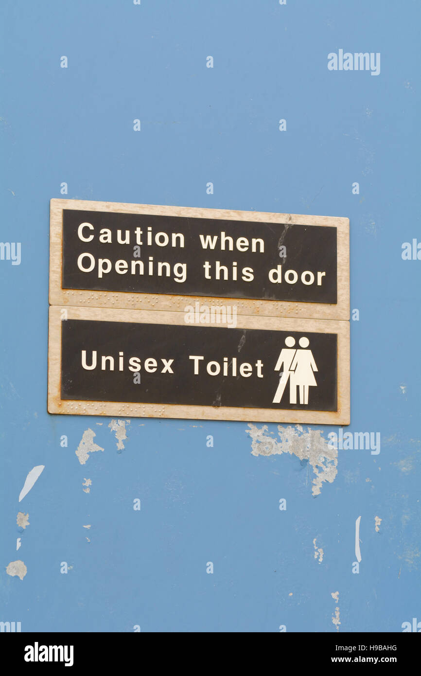 Unisex Toilet sign on door Stock Photo - Alamy