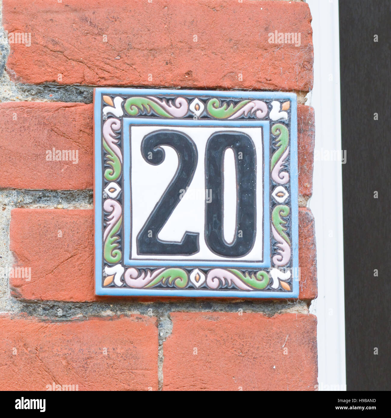 House Number 20 sign on wall Stock Photo - Alamy
