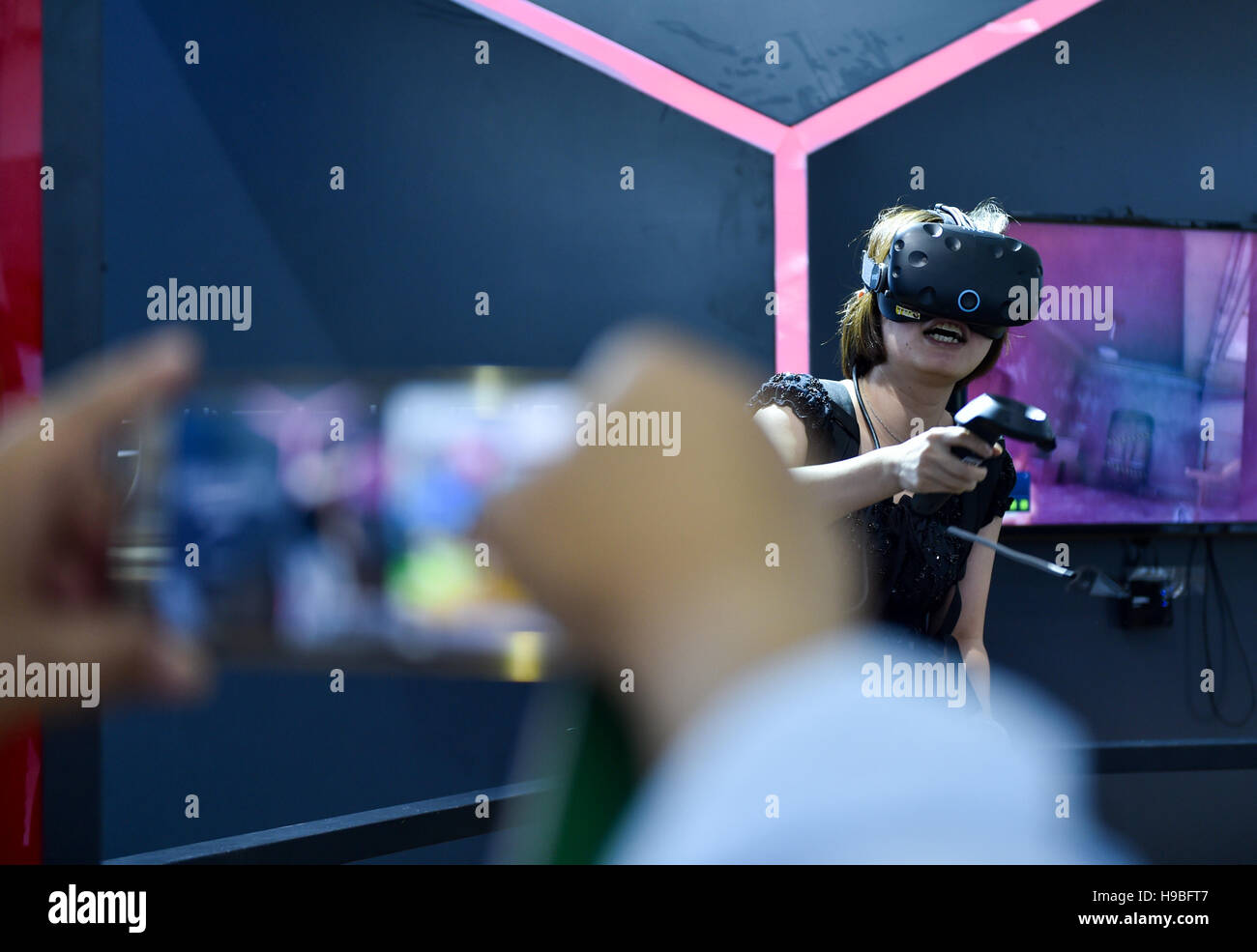 Shenzhen, China's Guangdong Province. 19th Nov, 2016. A woman ...