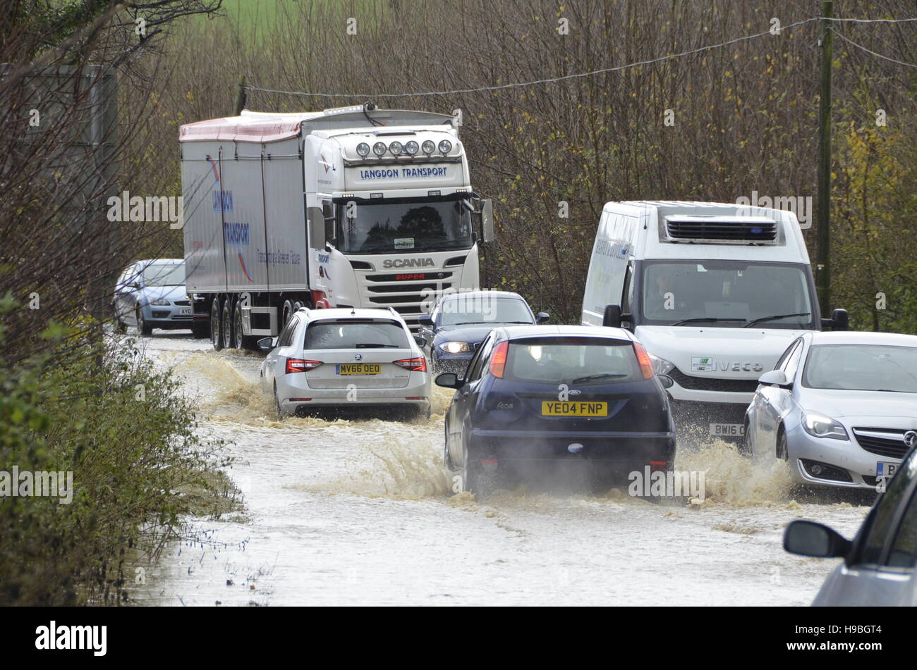 Cars Negotiating Flood Water High Resolution Stock Photography and ...