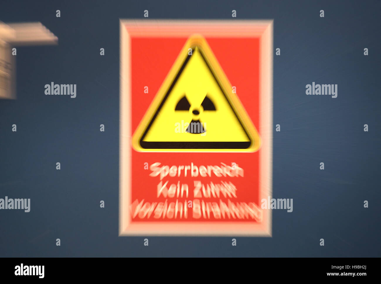 A warning sign written with 'prohibited area - no entry - caution ...