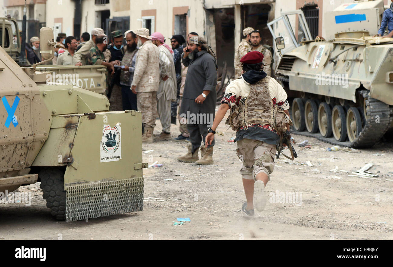 Sirte, Libya. 21st Nov, 2016. Members of the forces loyal to Libya's ...