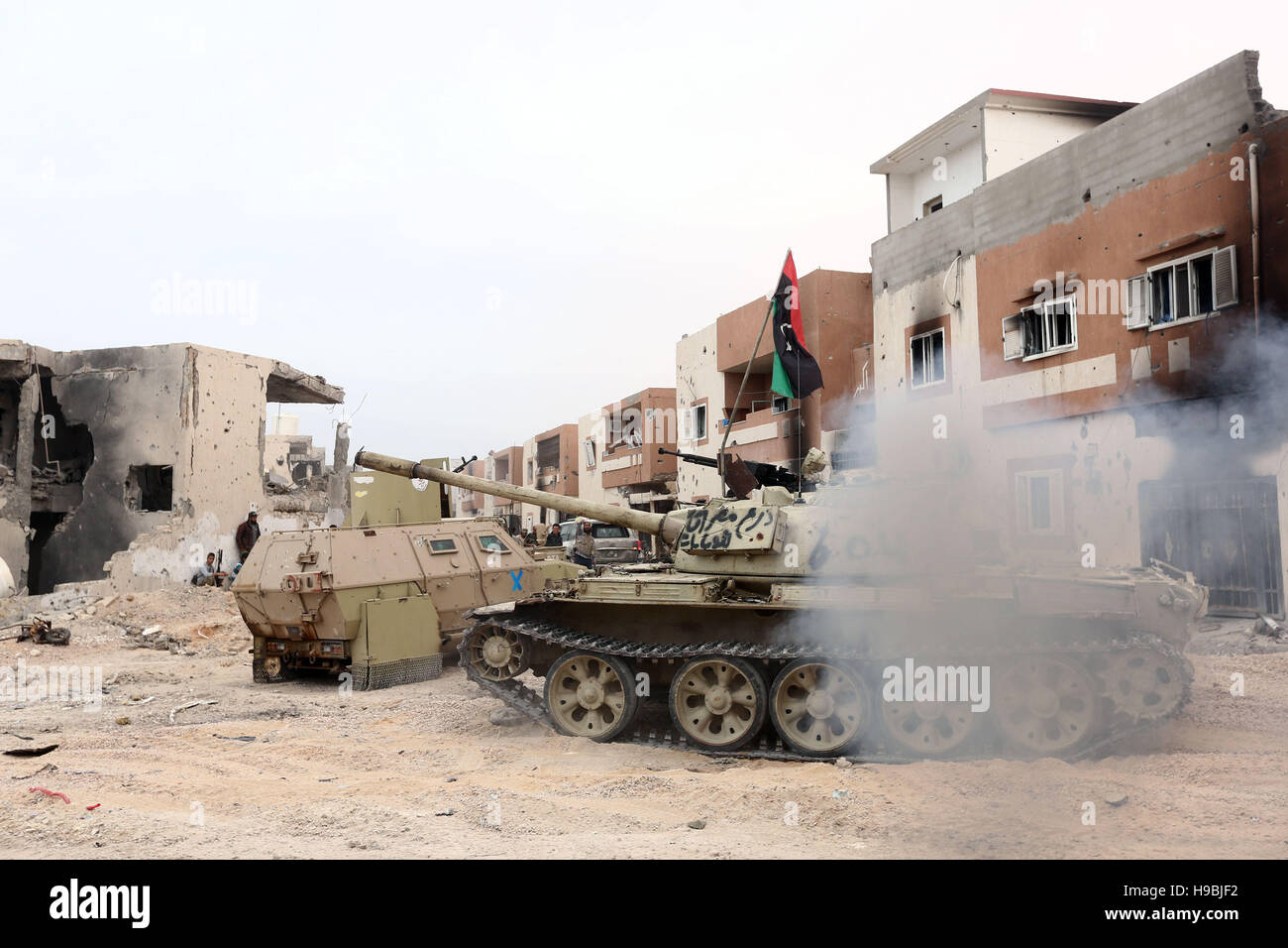Sirte, Libya. 21st Nov, 2016. Members of the forces loyal to Libya's ...