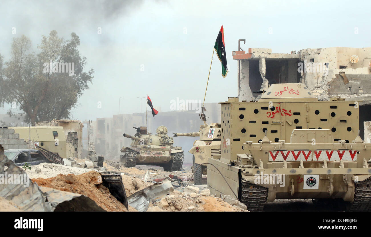 Sirte, Libya. 21st Nov, 2016. Members of the forces loyal to Libya's ...