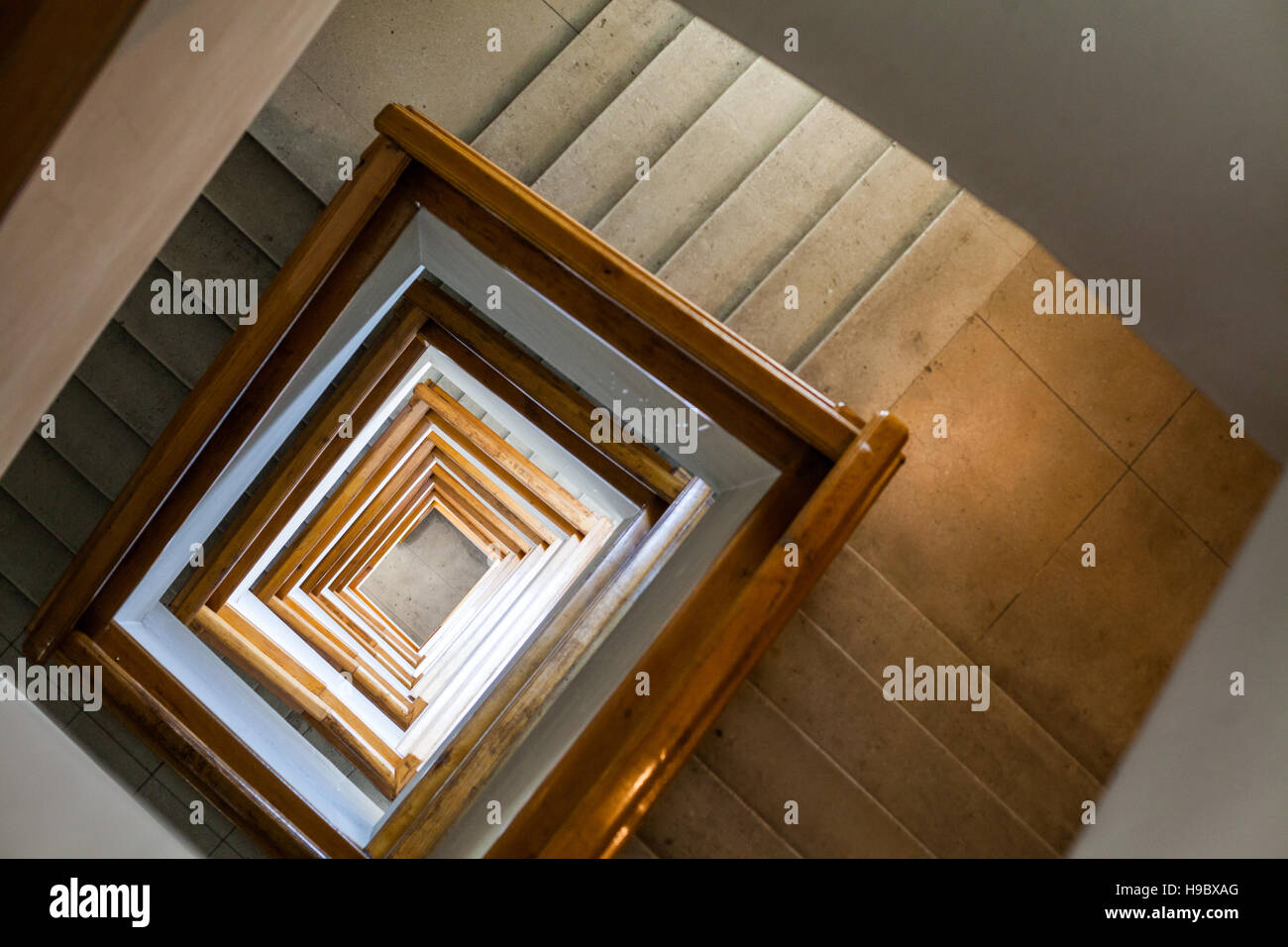 Color image of a spiral square staircase in a building Stock Photo - Alamy