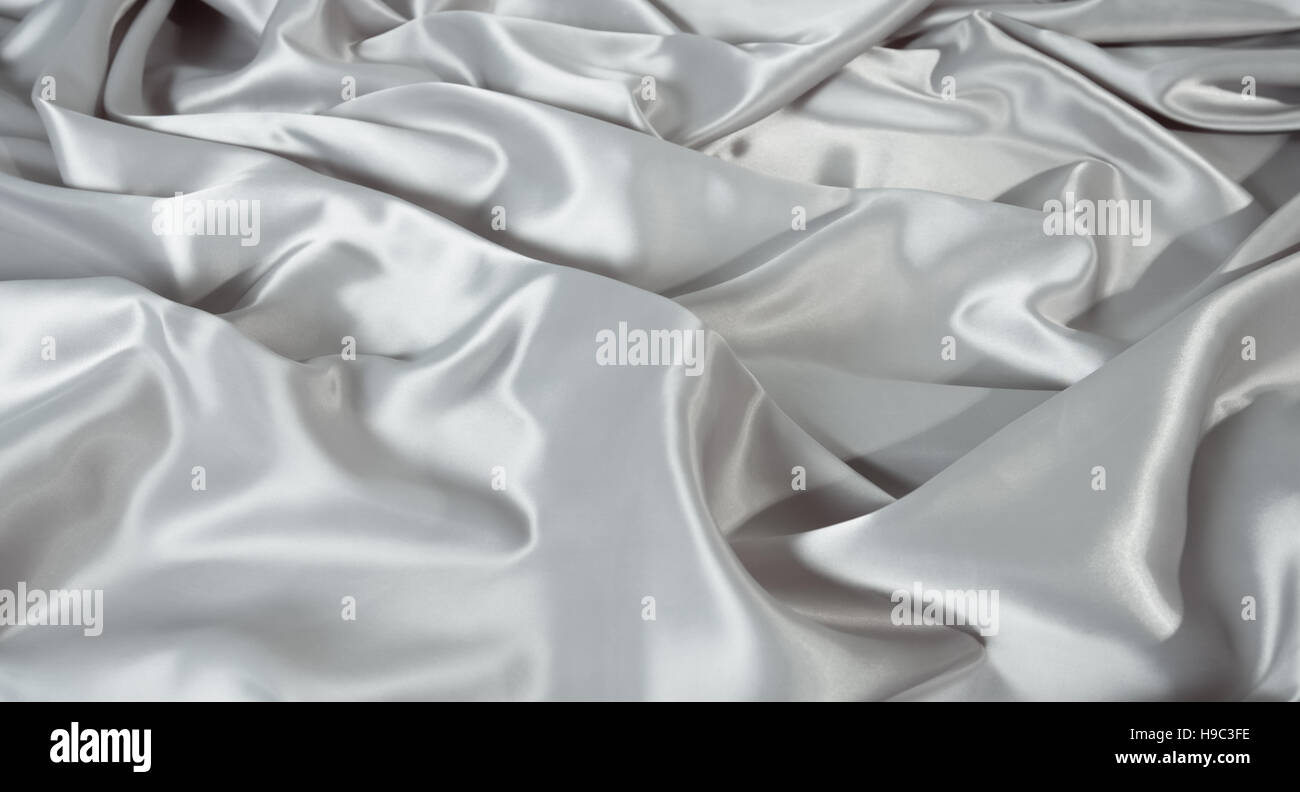 Wrapping grey abstract silky material Stock Photo - Alamy