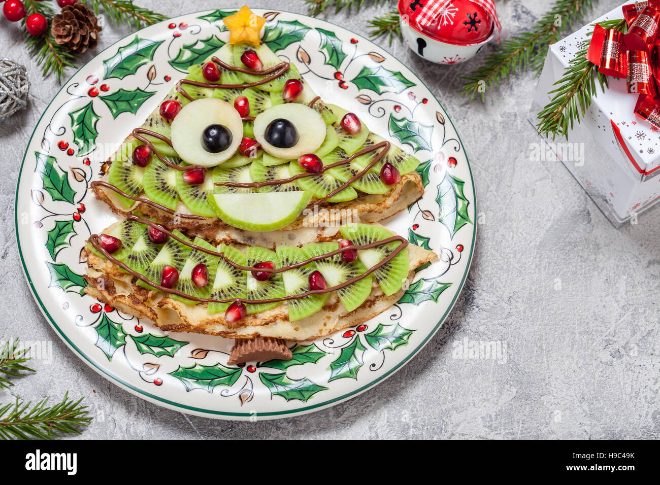 Funny Christmas tree shaped sweet pancakes crepes for breakfast Stock ...