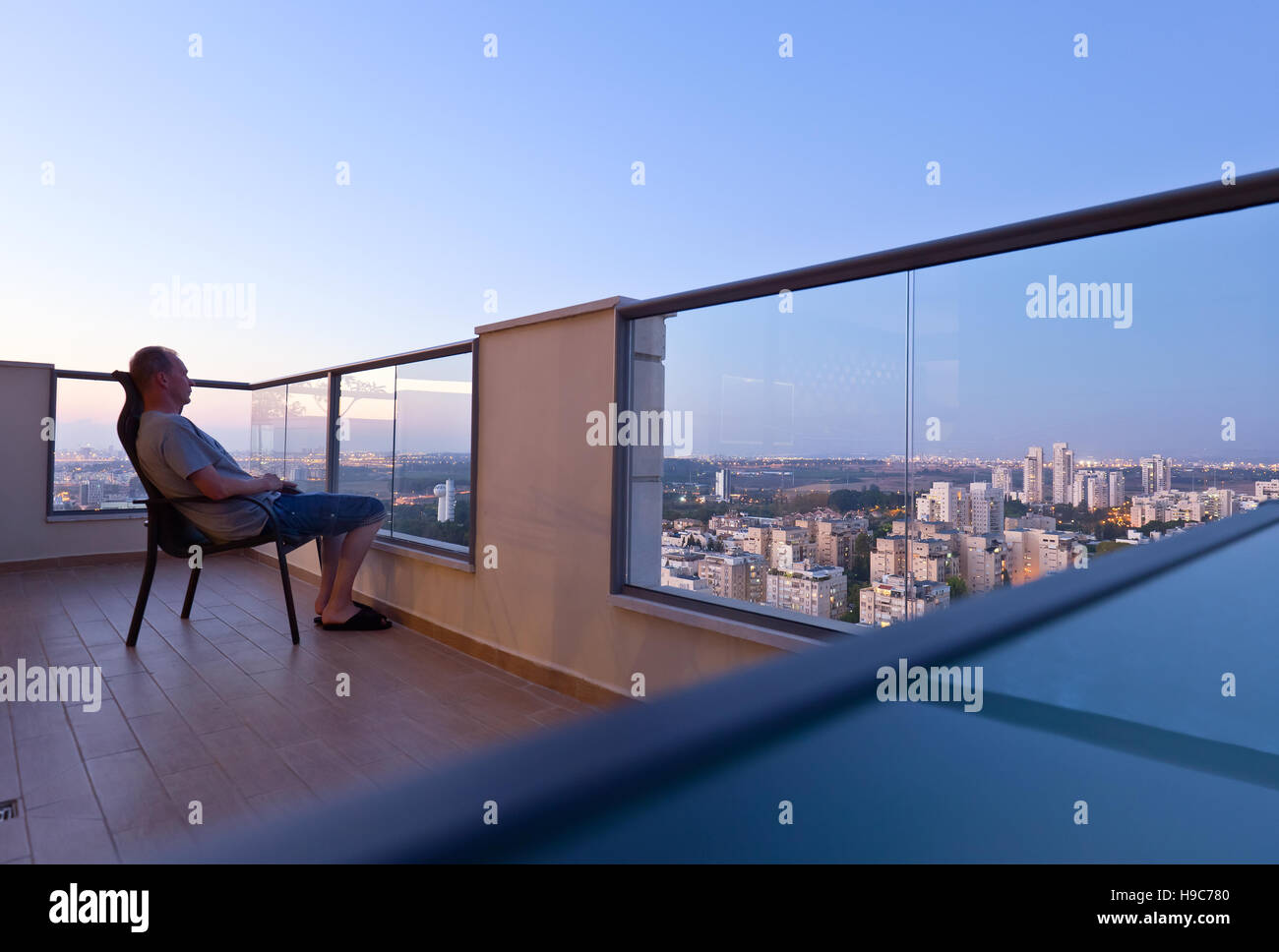 High end balcony in downtown of modern city Stock Photo - Alamy