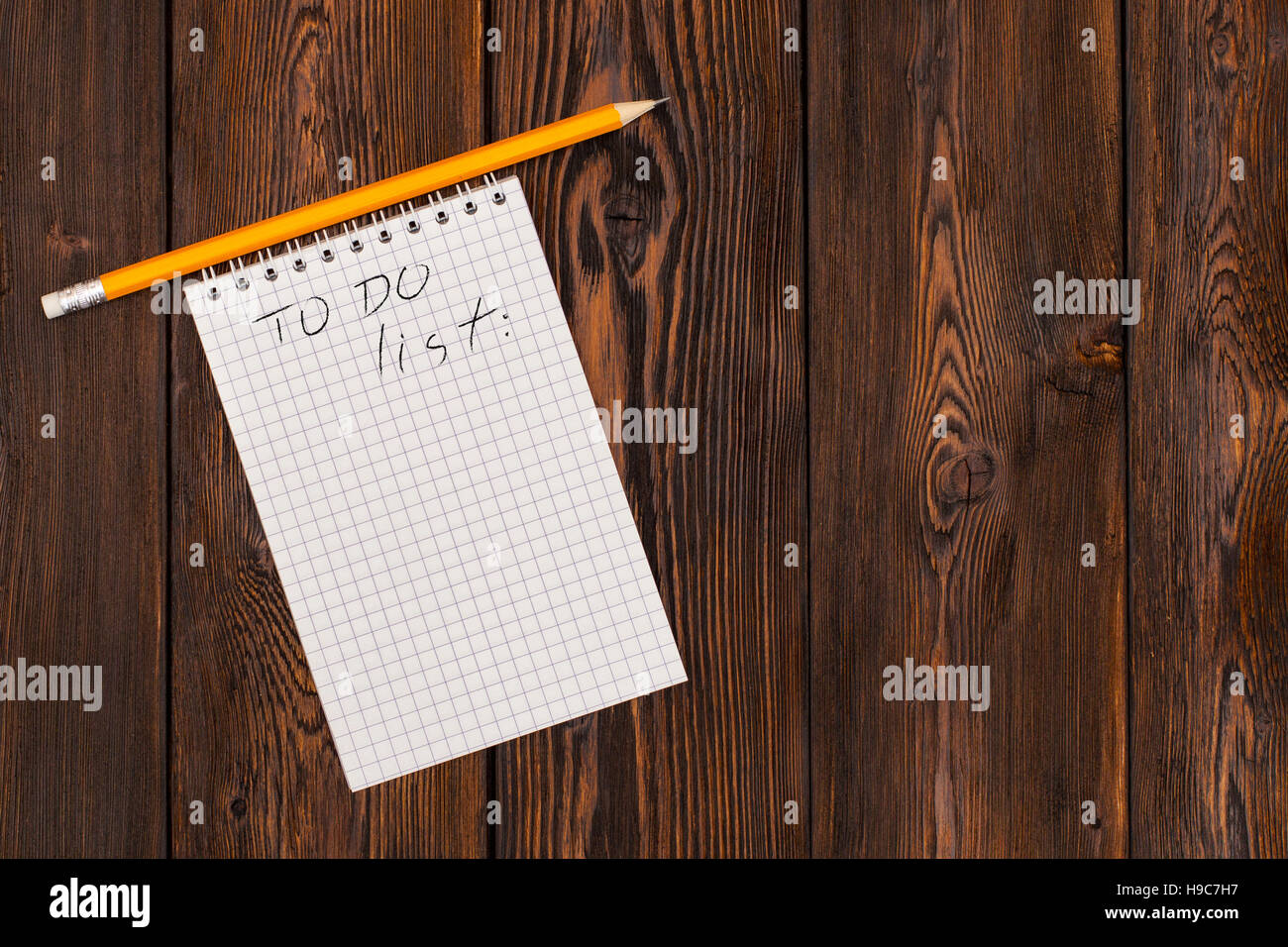 Blank notebook and pencil with todo list Stock Photo - Alamy