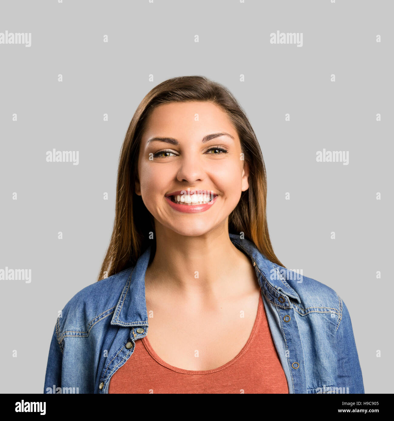 Portrait of a beautiful and happy woman smiling Stock Photo - Alamy