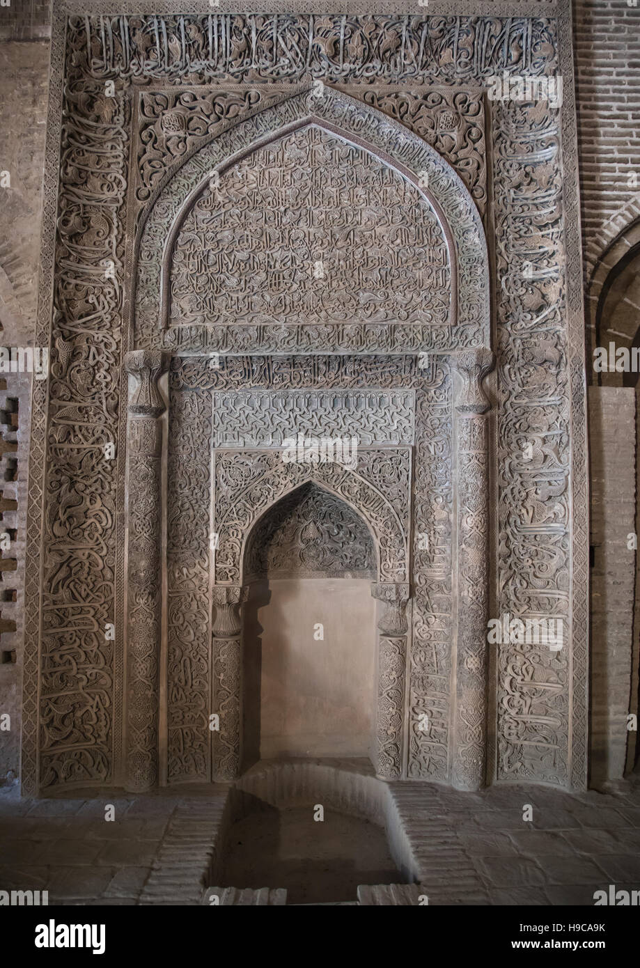 Ornate arabic calligraphy on the oljeitu mihrab at the jameh masjid or ...