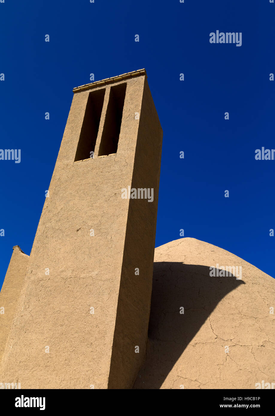 Wind towers used as a natural cooling system for water reservoir in ...