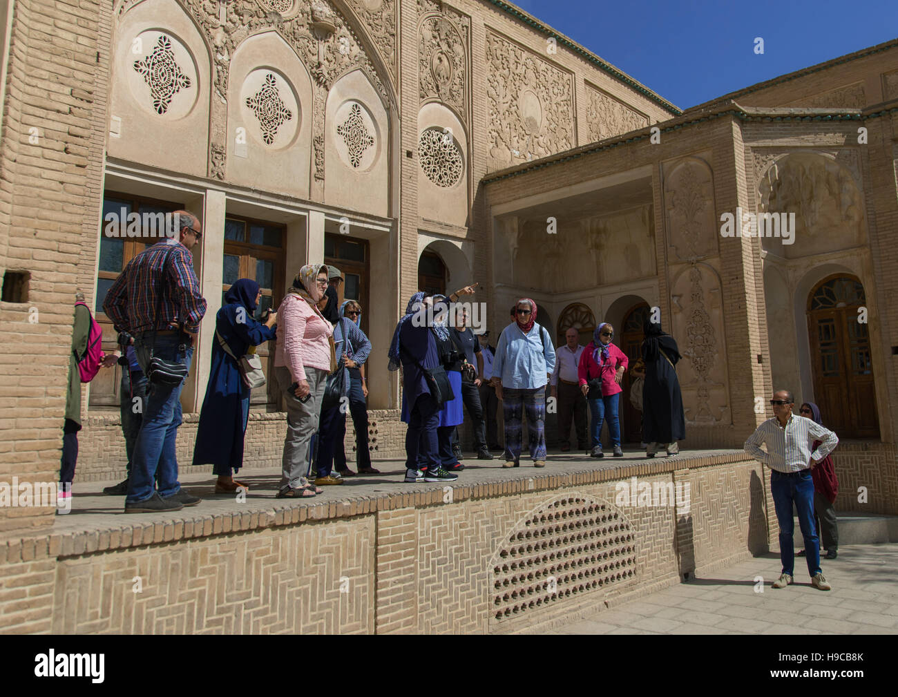 Tourists visiting boroujerdi historical house, Isfahan province, Kashan ...