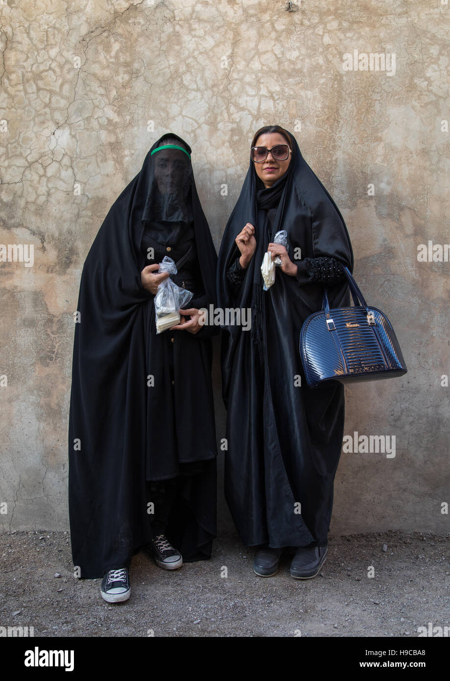 Two iranian shiite women mourning imam hussein on the day of tasua ...
