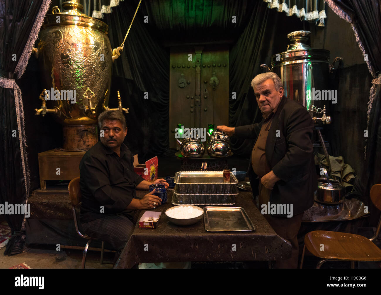 Shiite men offering free tea as nazri during muharram, Isfahan province ...