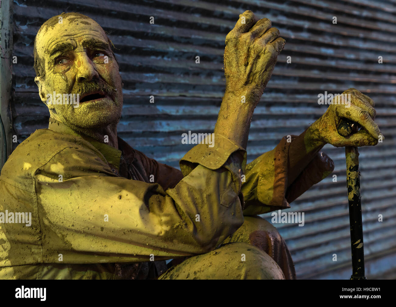 Iranian shiite muslim man crying after rubbing mud on his body during ...