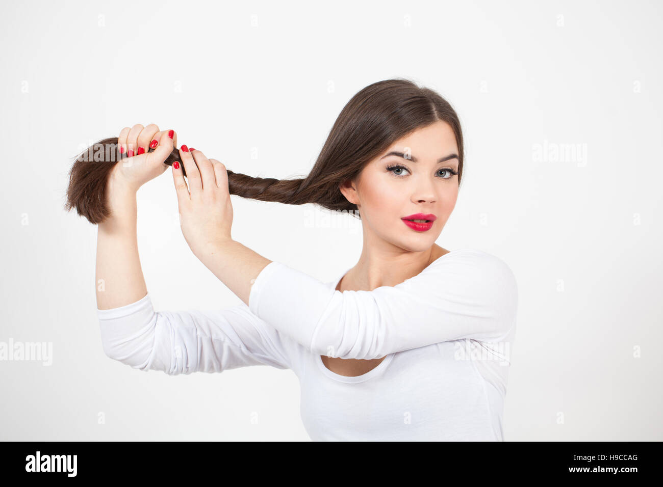 Beautiful Young Woman with Fresh Clean Skin touch own face. Healthy ...