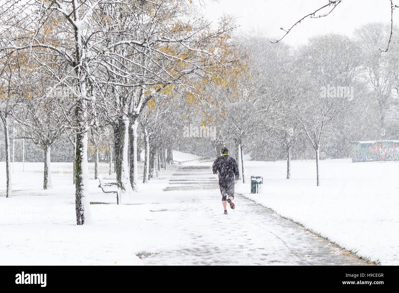 Jogger in Wibsey park, Bradford in Winter Stock Photo - Alamy