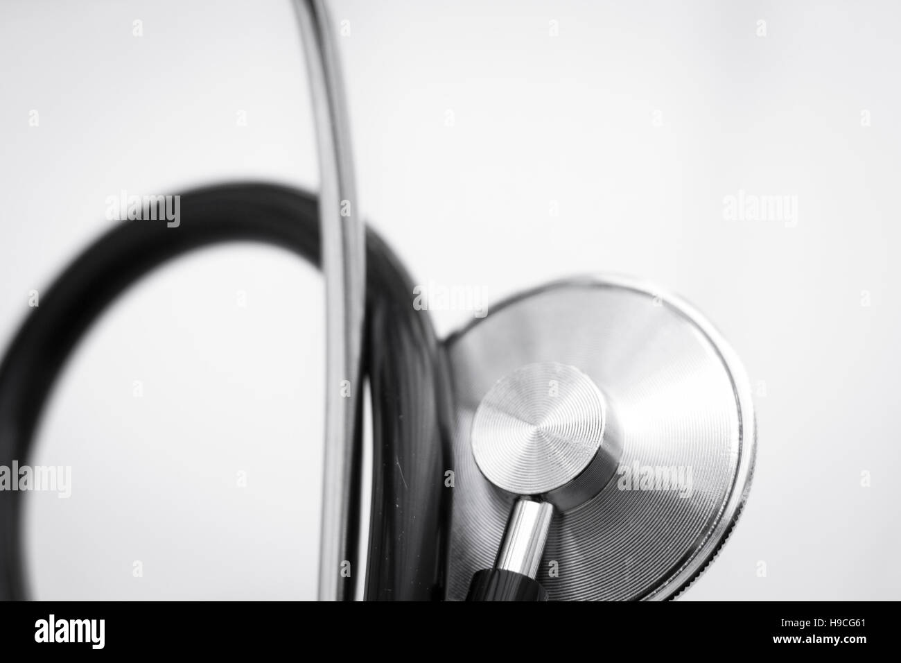 Medical doctor's stethoscope used to listen to patient heart rate ...