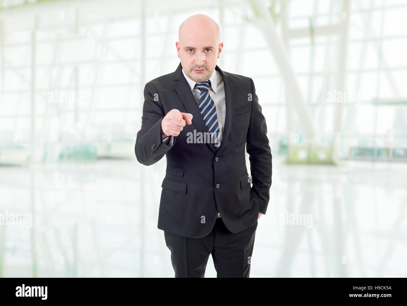 young business man pointing, at the office Stock Photo - Alamy