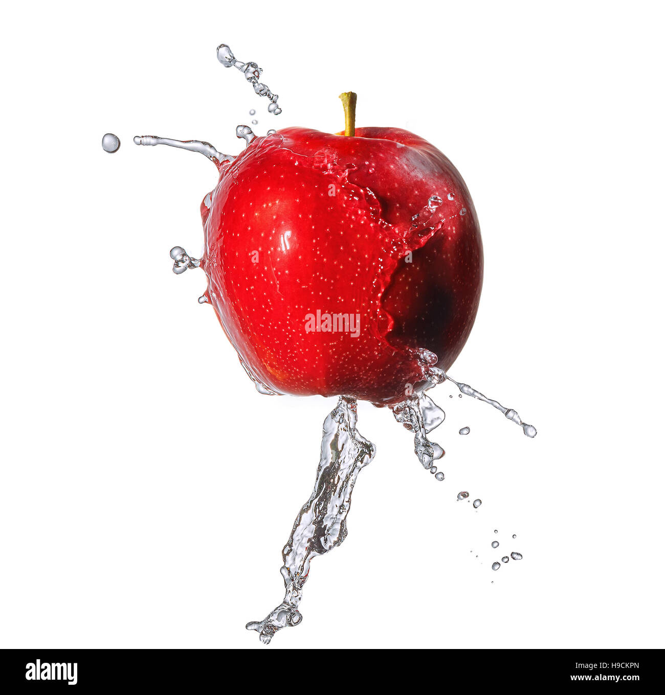 Water splash with apple isolated Stock Photo - Alamy