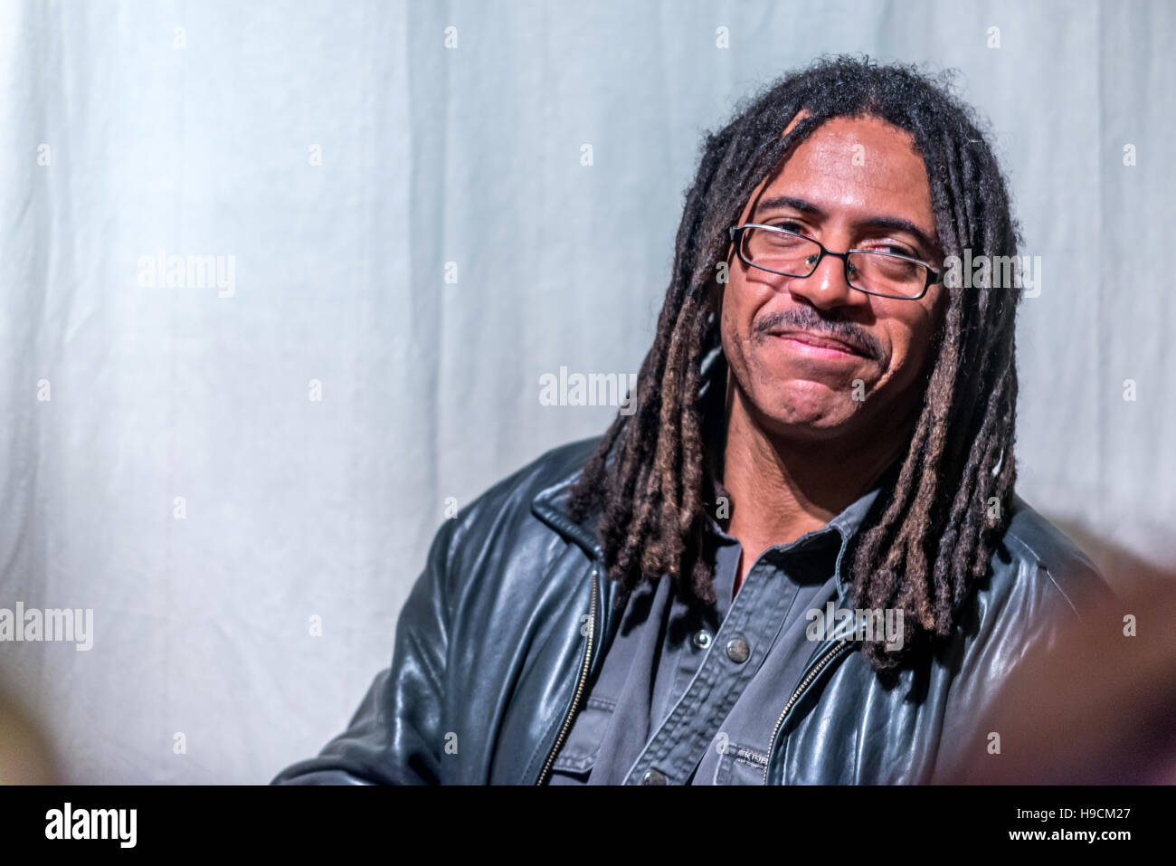 American novelist Michael Datcher at a reading Stock Photo - Alamy