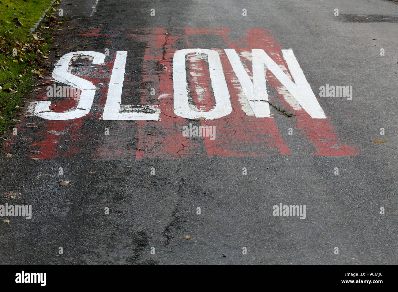 Slow Road Marking High Resolution Stock Photography and Images - Alamy