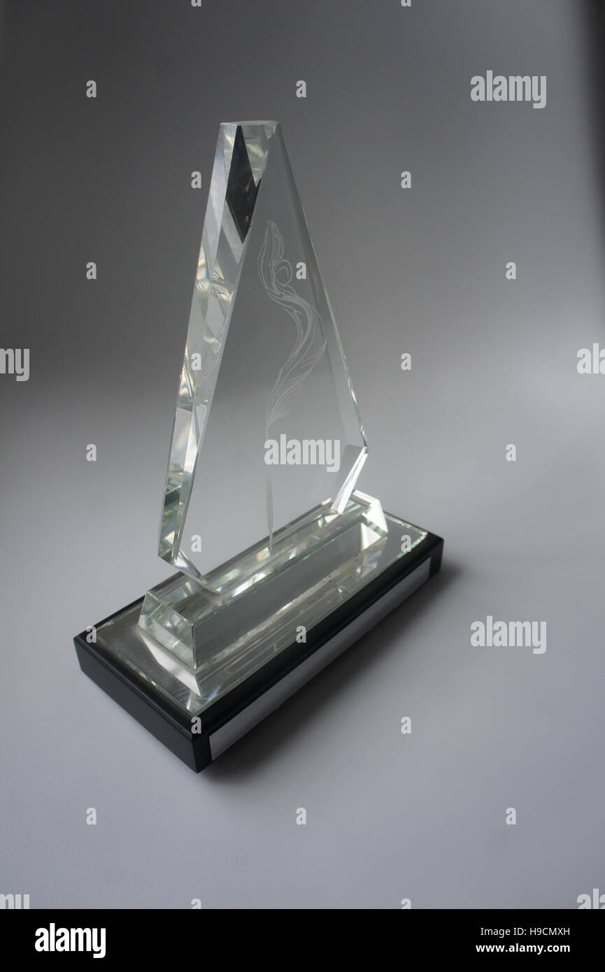 Close up of a glass trophy Stock Photo - Alamy