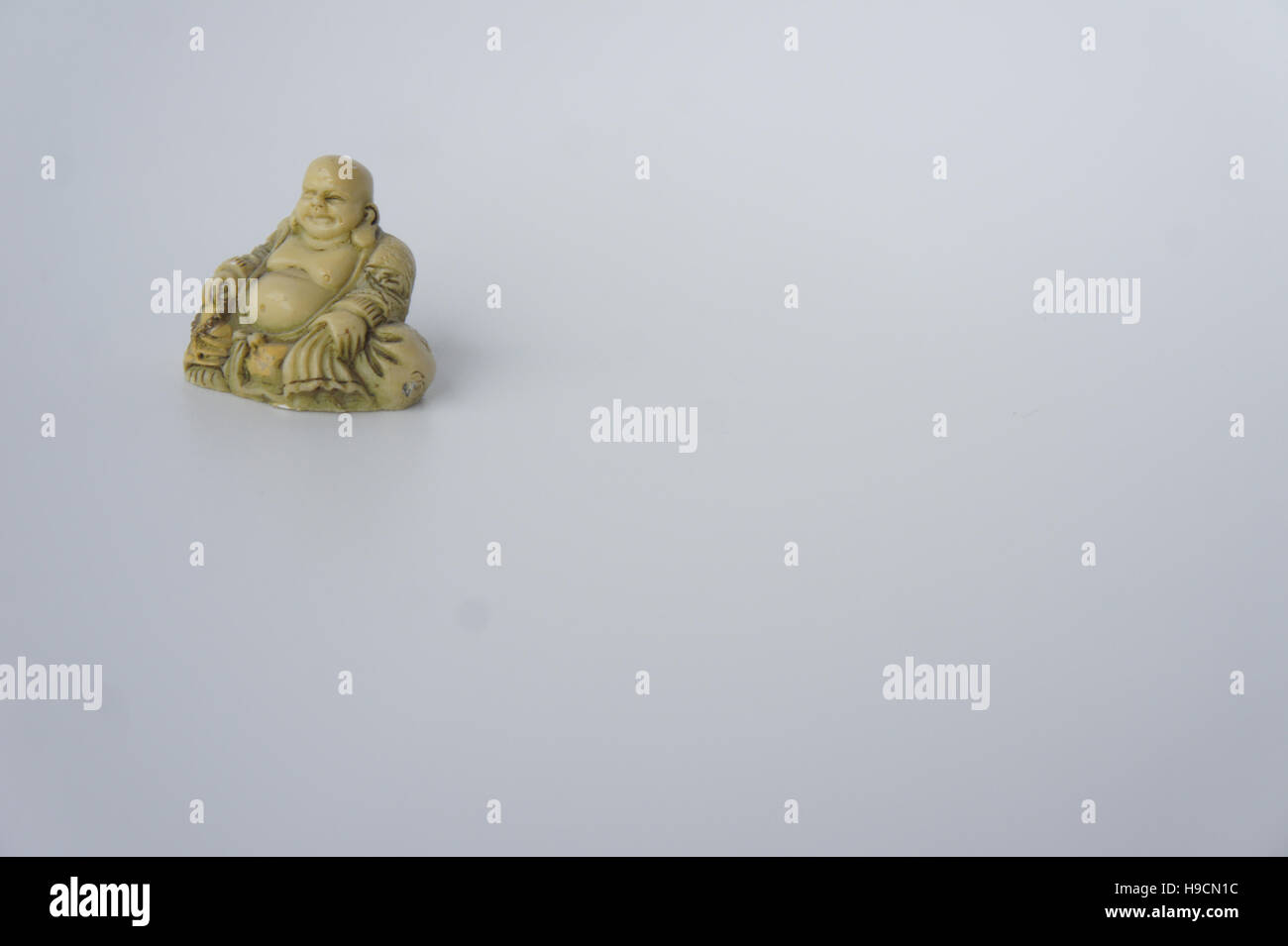 Small statue of Buddha Stock Photo - Alamy
