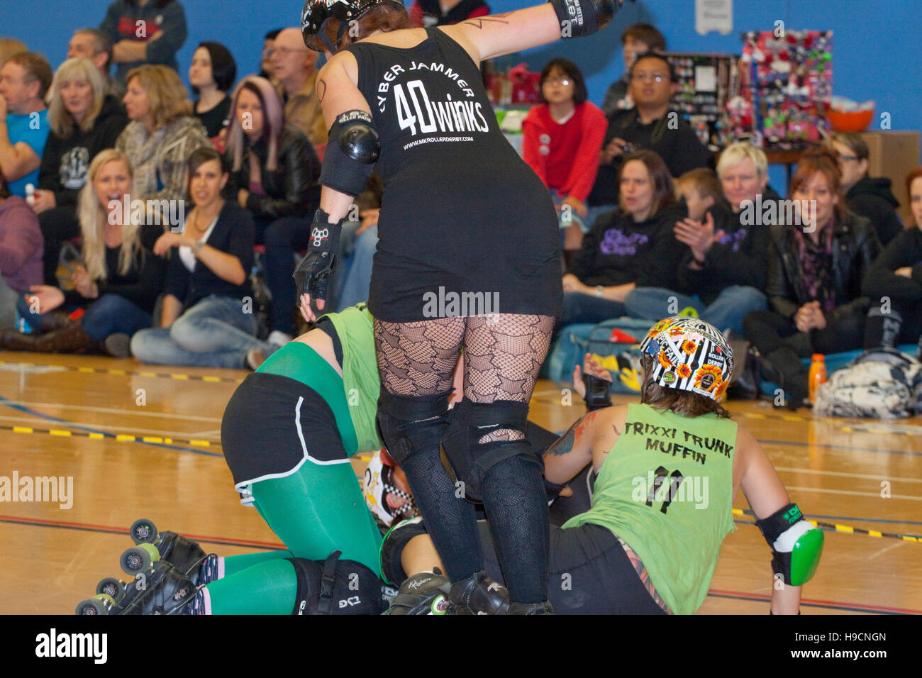 Roller derby skaters in action Stock Photo - Alamy