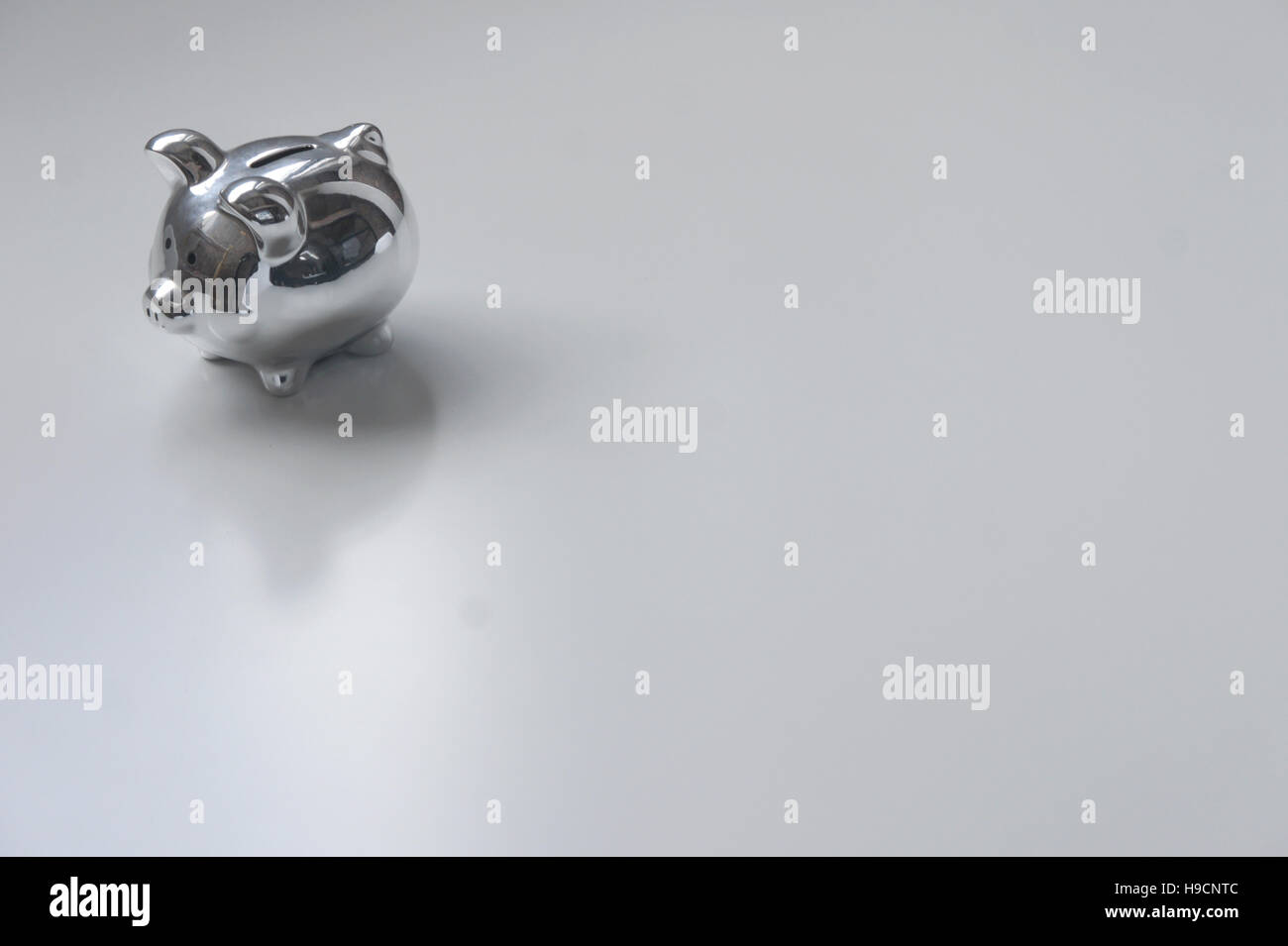 A shiny piggy bank Stock Photo - Alamy