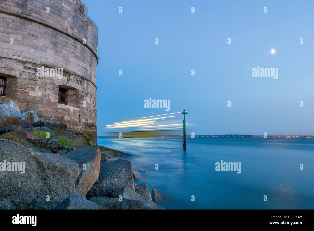 The Round Tower with a ferry transiting the River Solent at Portsmouth ...