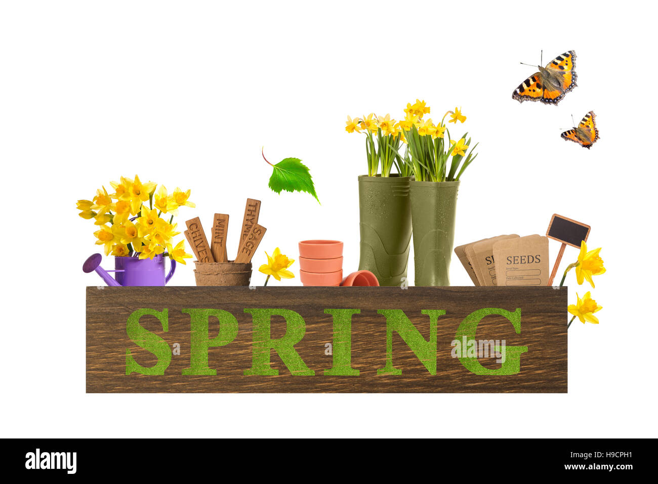 Wooden trough with gardening items for spring planting Stock Photo - Alamy
