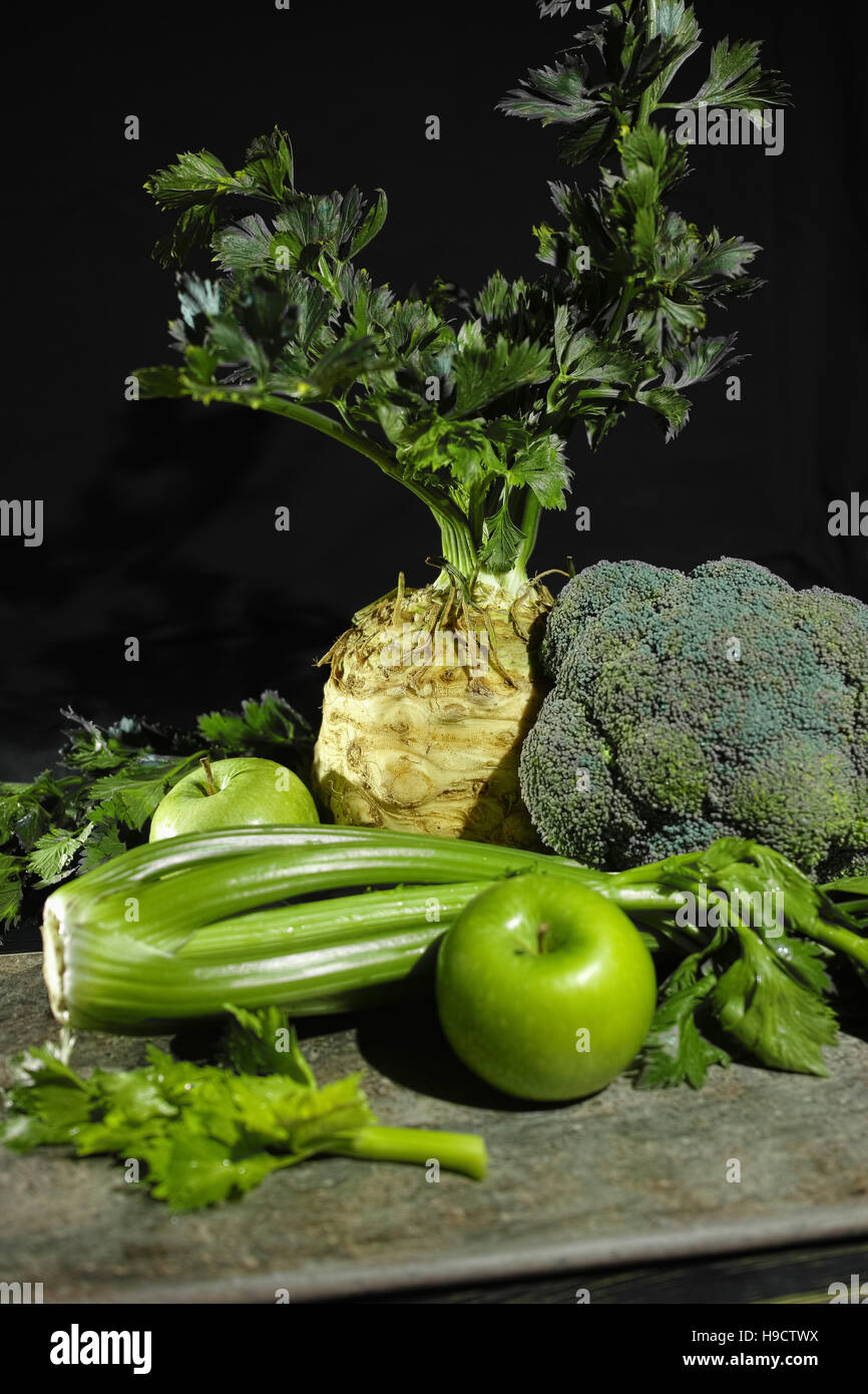 Green vegetables and fruits - celery, apples, celery root celeriac ...