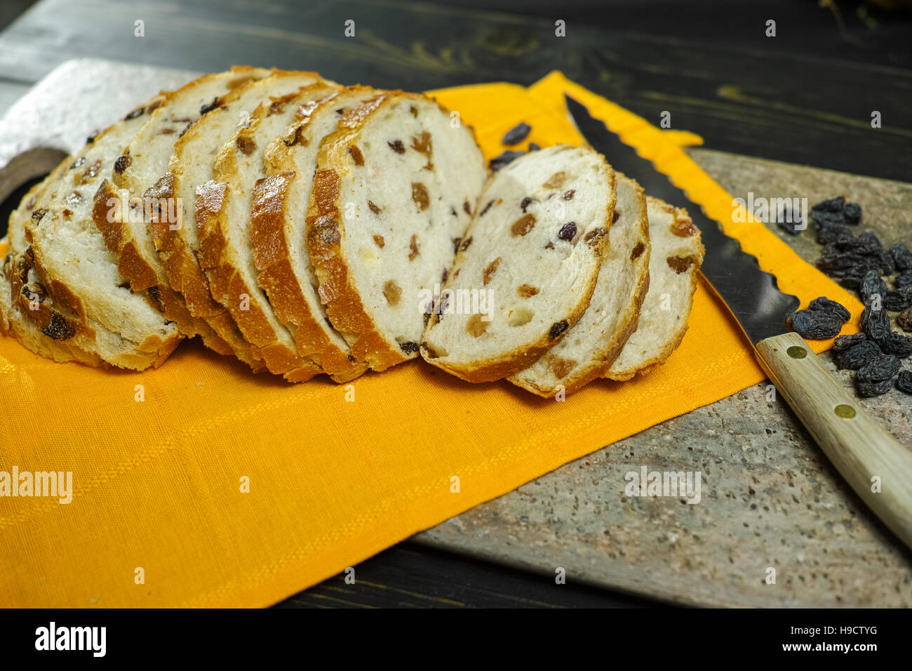 Fresh baked raisins bread sliced on granite board Stock Photo - Alamy