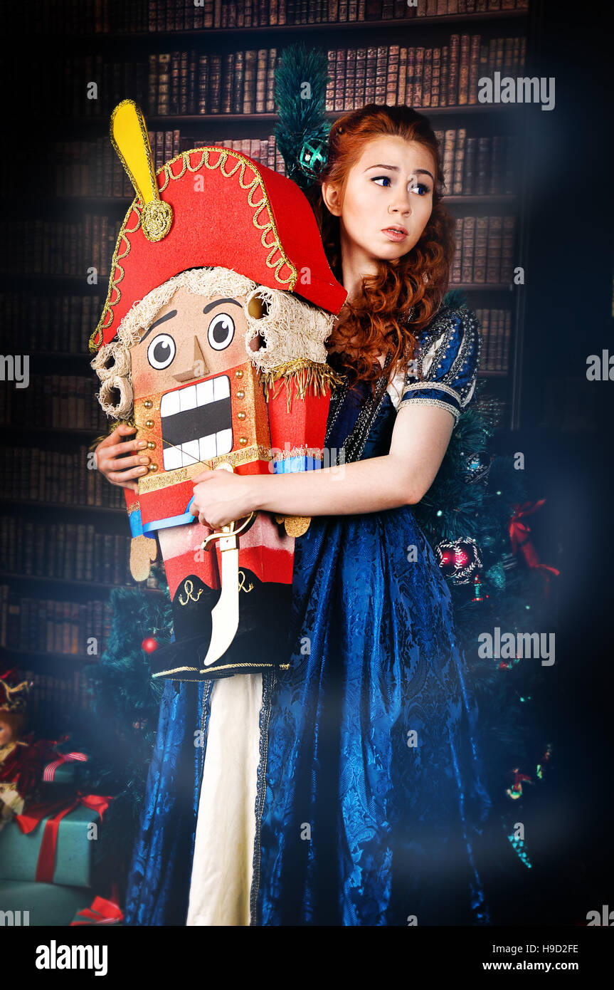 Beauty fashion woman who holding a nutcracker christmas Stock Photo - Alamy