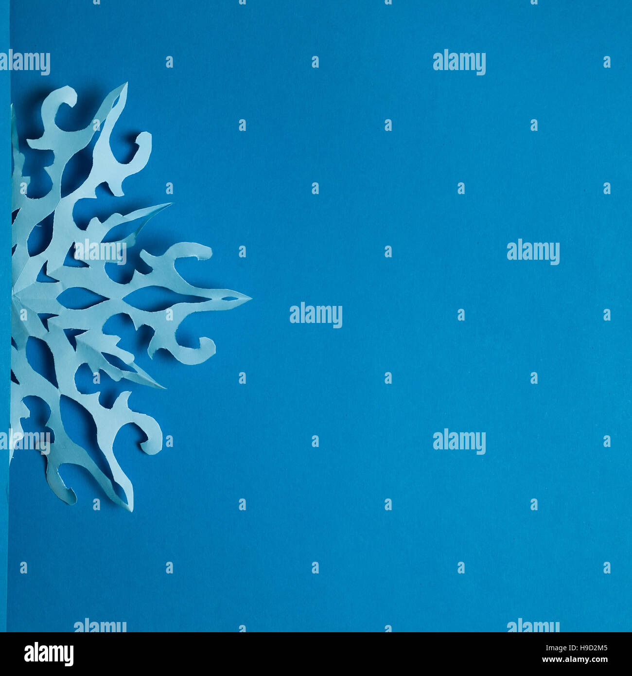 Blue paper snowflake hi-res stock photography and images - Alamy