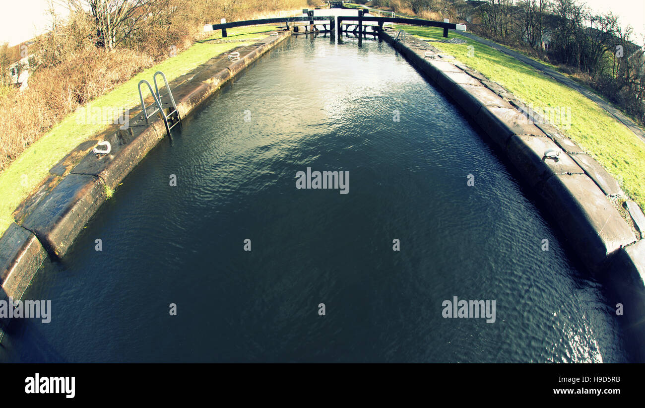 waterfall from a lock bridge on the Forth and Clyde canal, Glasgow ...