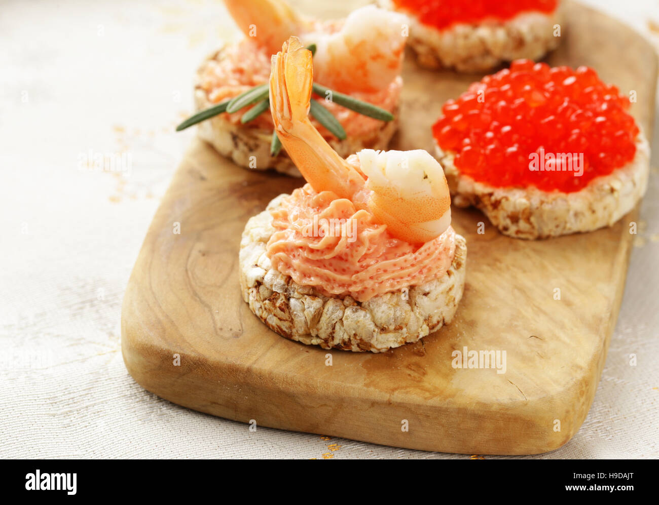 Christmas appetizers. Small tartlets with caviar and pate. Buffet and ...