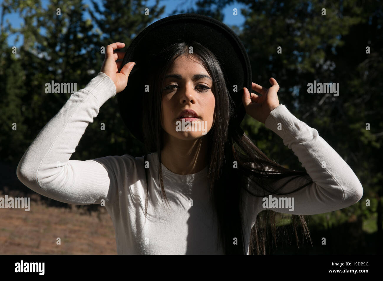 hipster girl posing in a balcony Stock Photo - Alamy