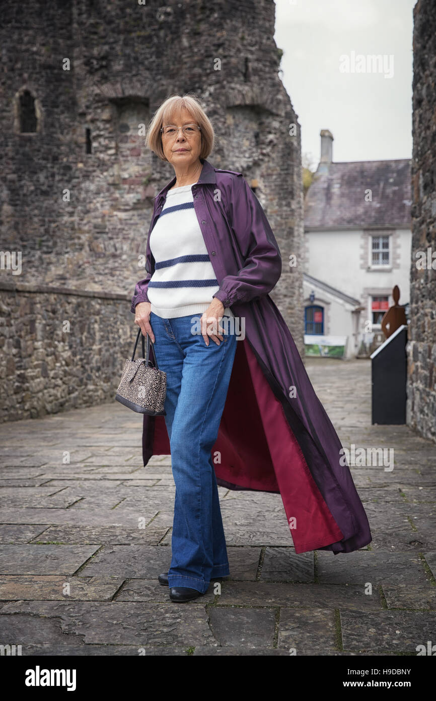 Tall Japanese senior lady models long cape like coat Stock Photo - Alamy