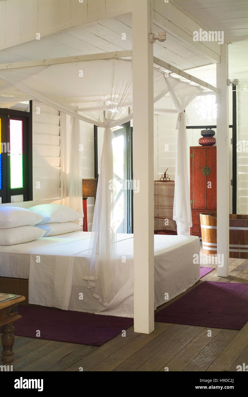 A guest room at Temple Tree, a resort of colonial-era houses on the ...