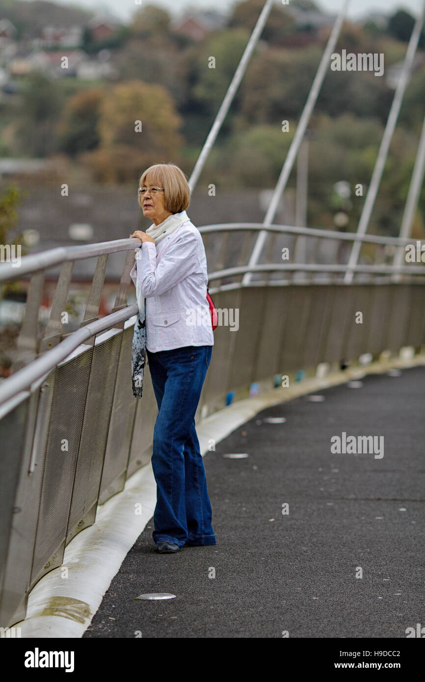 Lady on a bridge hi-res stock photography and images - Alamy