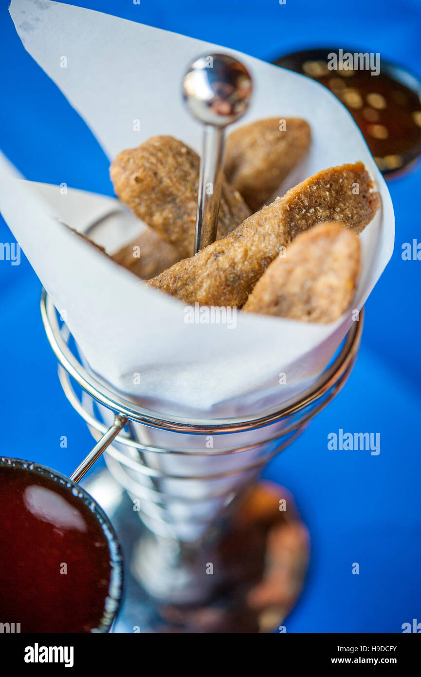 Keropok lekor, deep fried fish sausages eaten with chilli sauce, at the ...