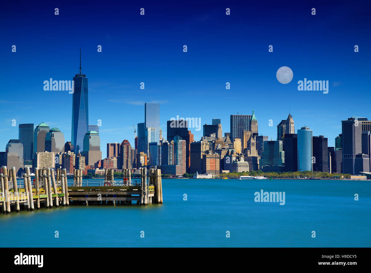 Full moon rising over Manhattan New York Stock Photo - Alamy