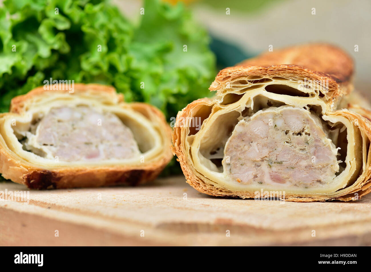 Pâté en croûte on a wooden choppng board Stock Photo - Alamy