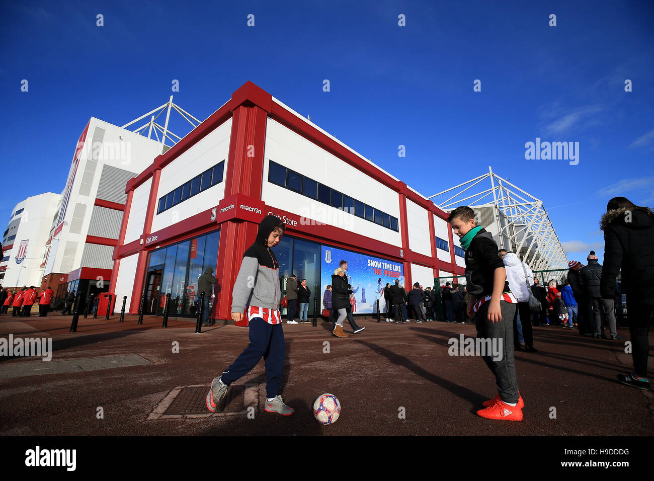 Stoke City fans play football outside the Bet365 Stadium Stock Photo ...